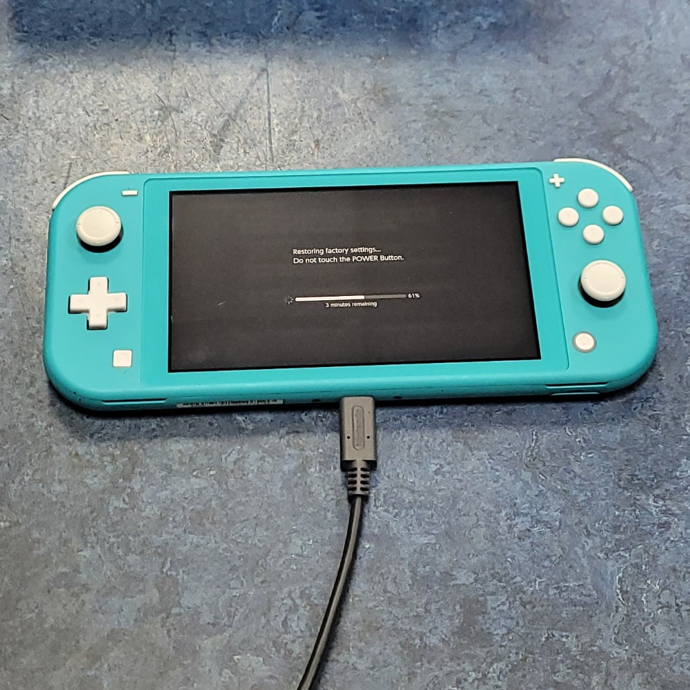 Pre-owned Nintendo Switch Lite, Boxed - Own4Less